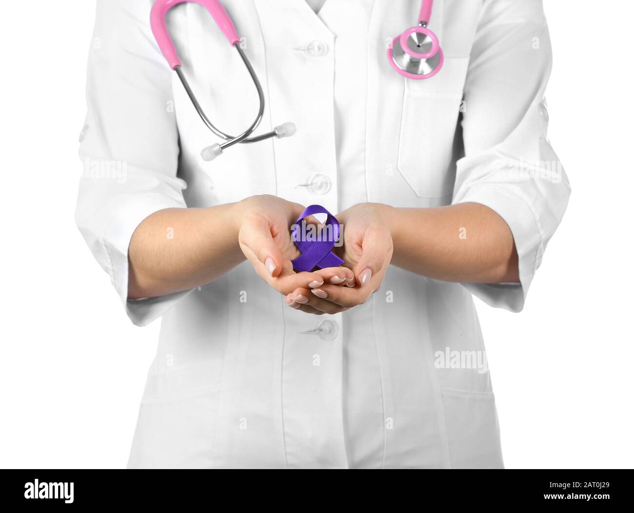 Doctor with purple ribbon as symbol of World Cancer Day on white ...