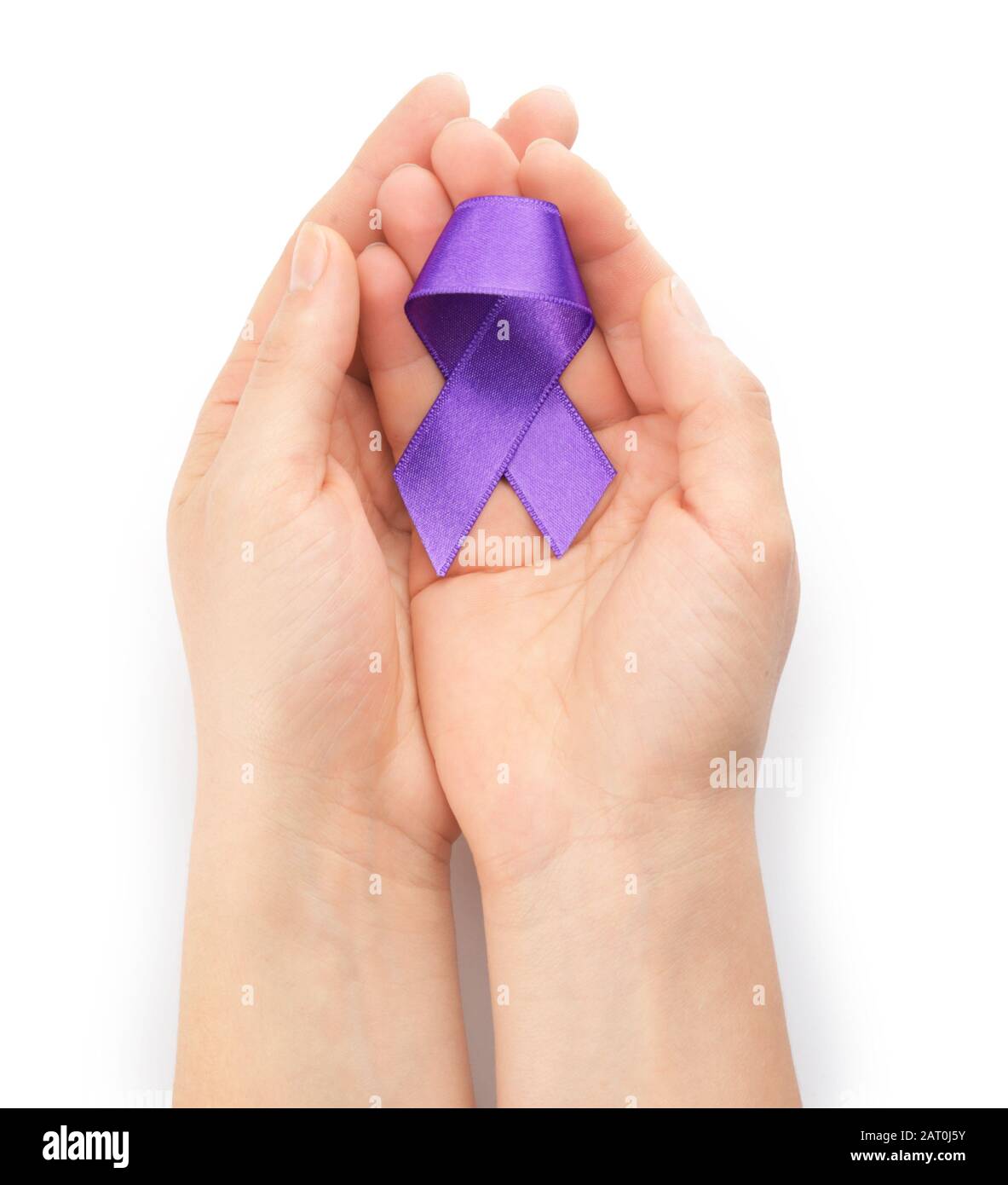 Female hands with purple ribbon as symbol of World Cancer Day on white ...