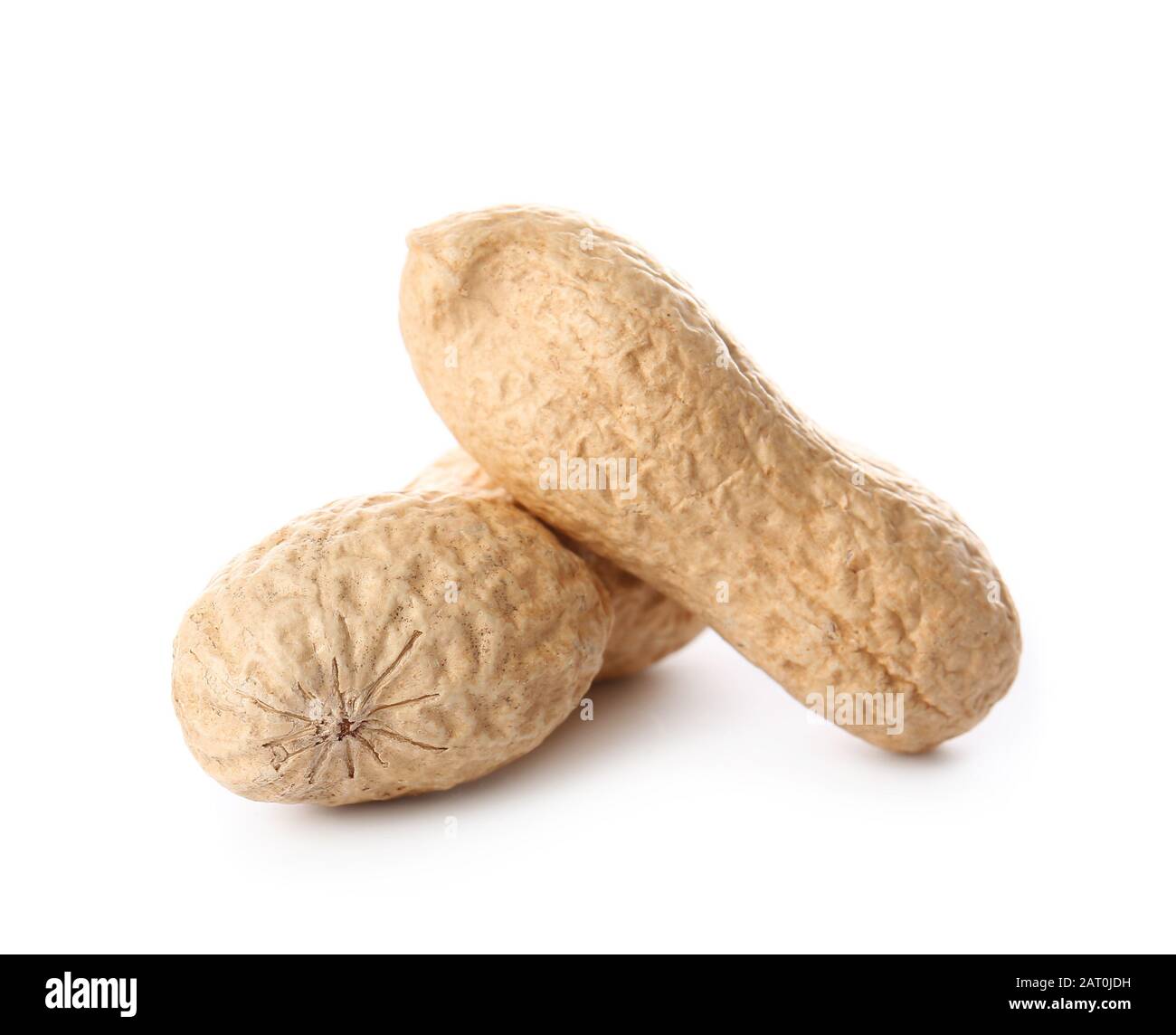 Tasty peanuts on white background Stock Photo - Alamy