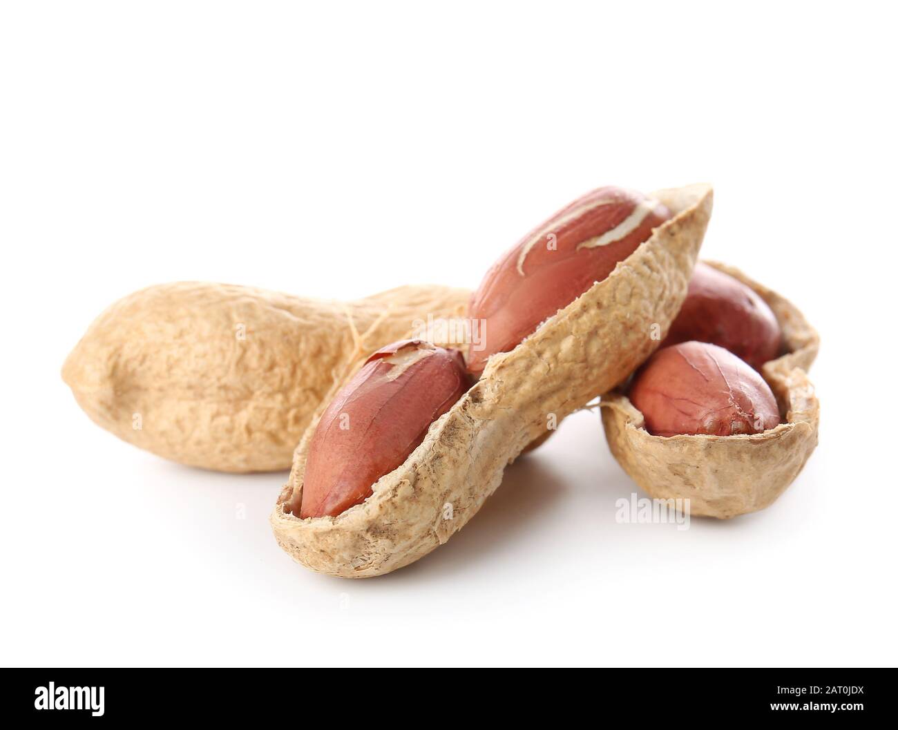 Tasty peanuts on white background Stock Photo - Alamy