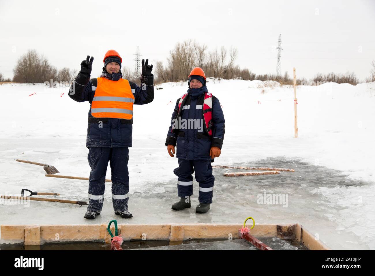 Two workers at the site of the ice camp Stock Photo - Alamy