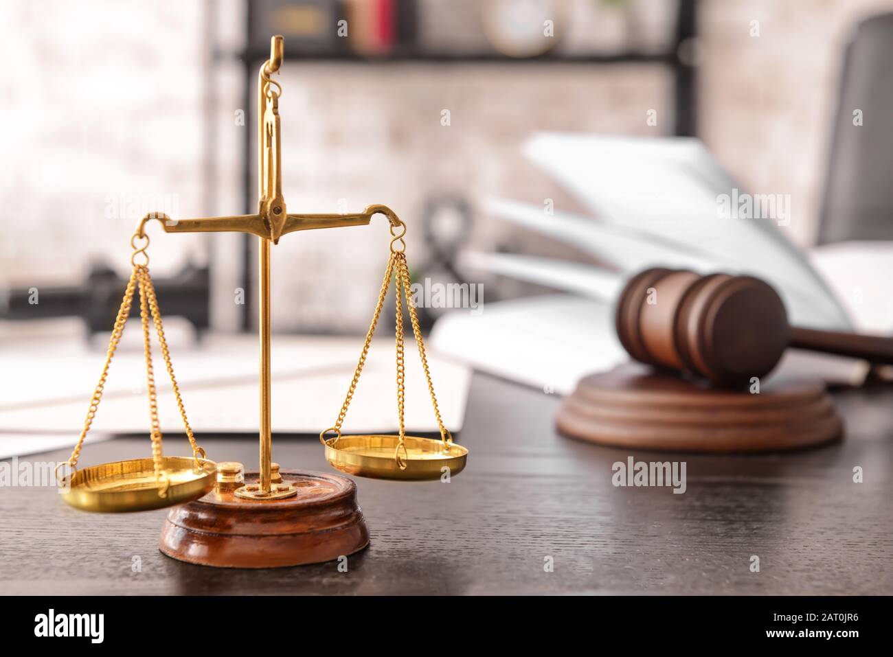Scales of justice on lawyer's workplace Stock Photo - Alamy