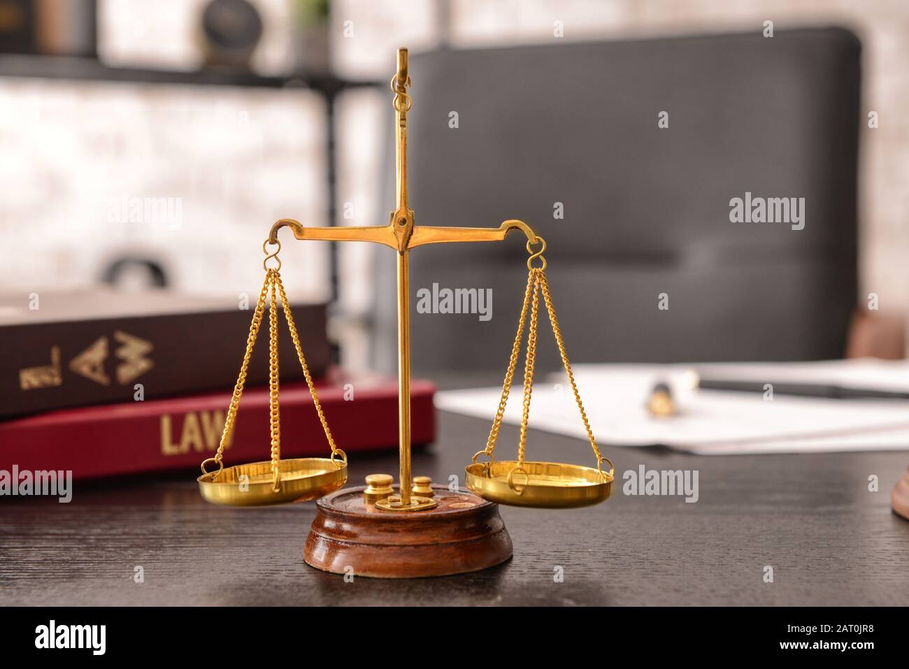 Scales of justice on lawyer's workplace Stock Photo - Alamy