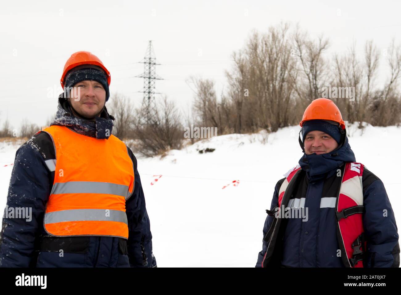 Two workers at the site of the ice camp Stock Photo - Alamy