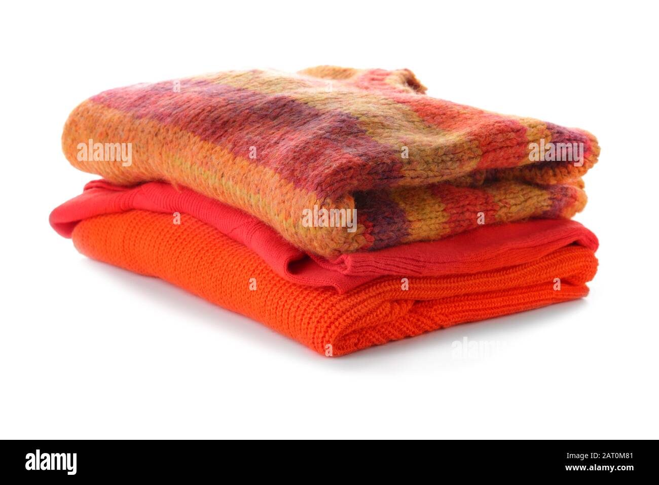 Stack of clean clothes on white background Stock Photo - Alamy