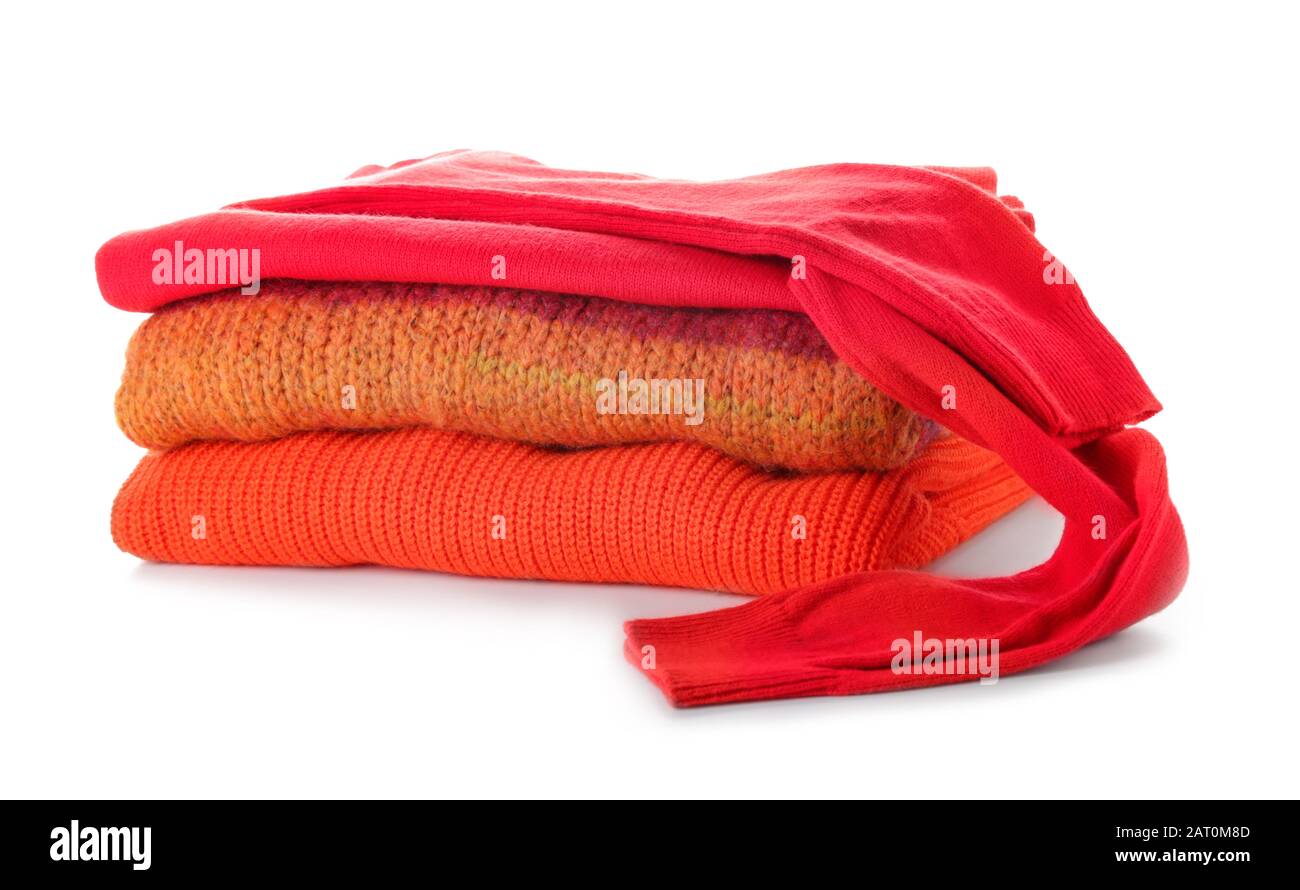 Stack of clean clothes on white background Stock Photo - Alamy