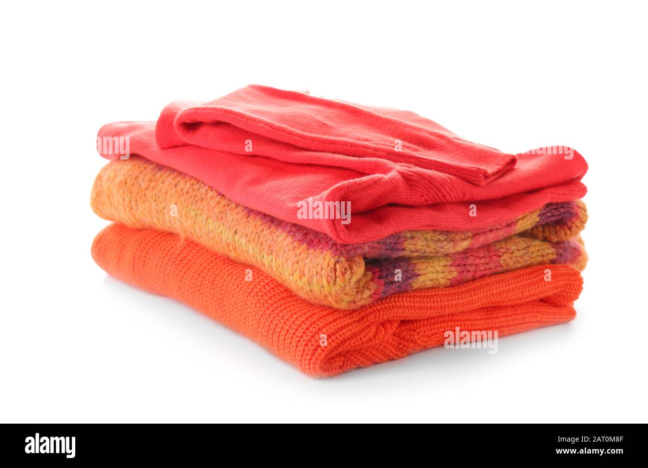Stack of clean clothes on white background Stock Photo - Alamy