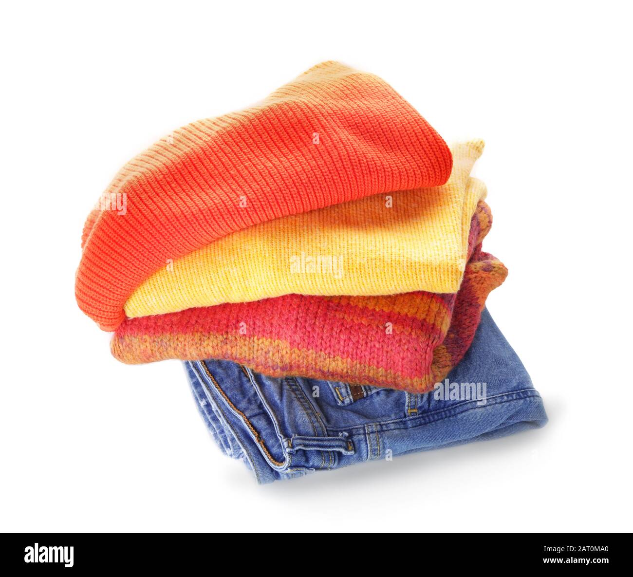 Stack of clean clothes on white background Stock Photo - Alamy