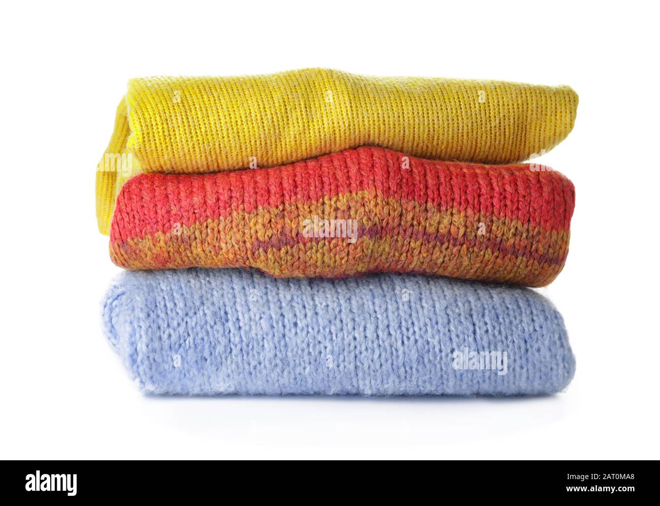 Stack of clean clothes on white background Stock Photo - Alamy