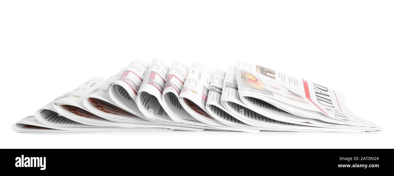 Many newspapers on table against white background Stock Photo - Alamy