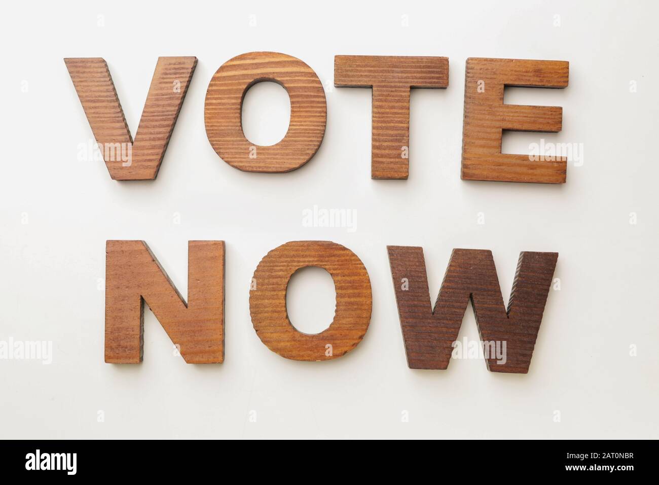 Text VOTE NOW on white background Stock Photo - Alamy