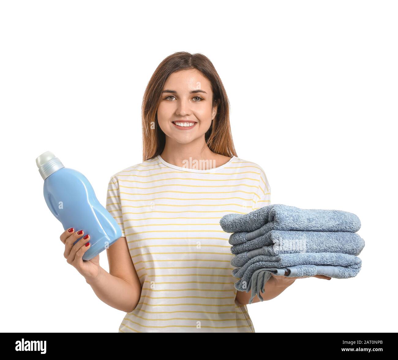 Beautiful young woman with laundry on white background Stock Photo - Alamy