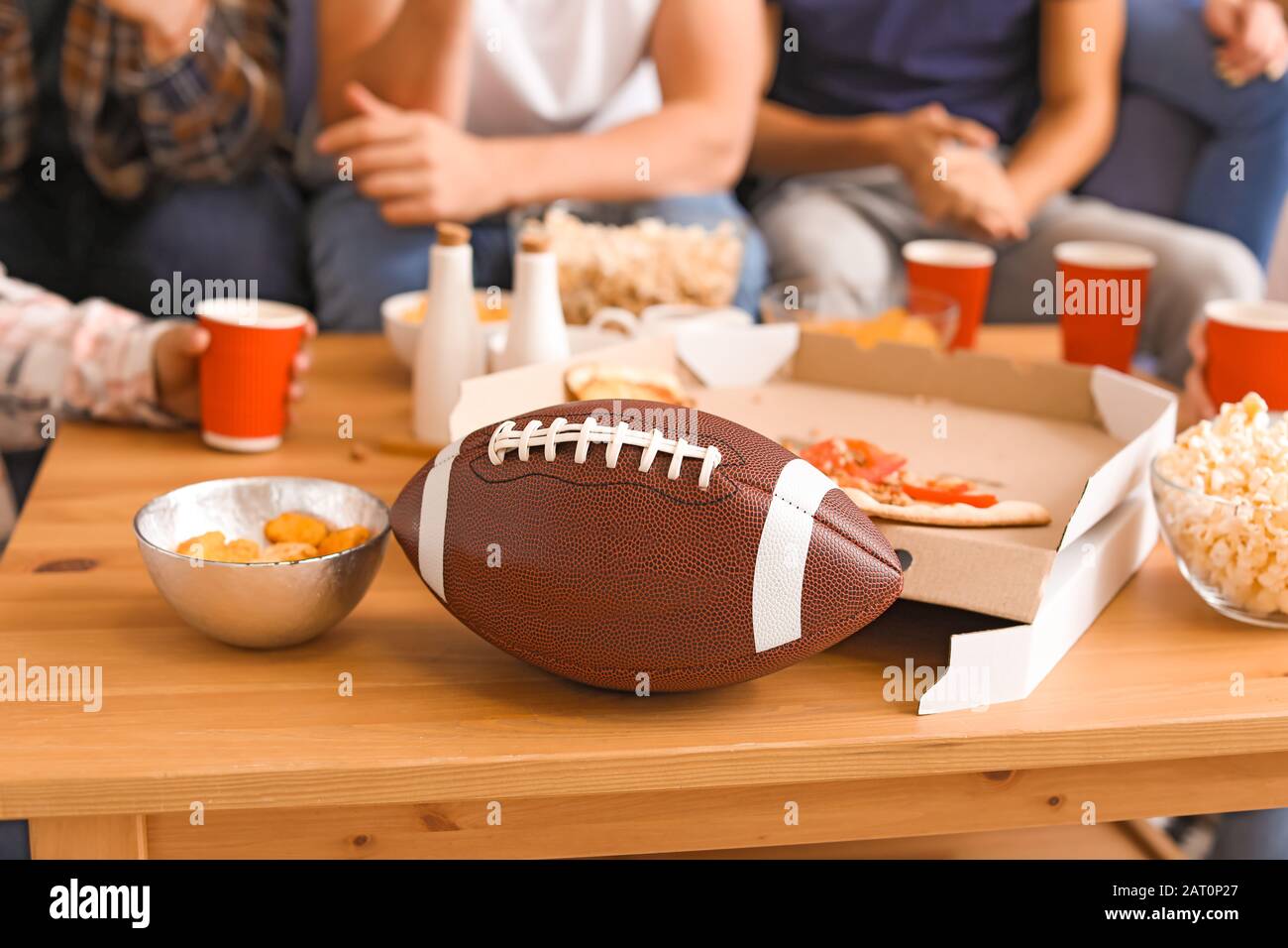 Table with tasty snacks during watching rugby on TV Stock Photo - Alamy