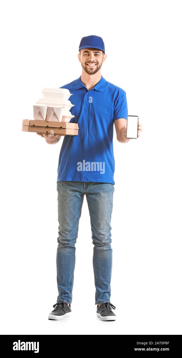 Handsome worker of food delivery service with mobile phone on white ...