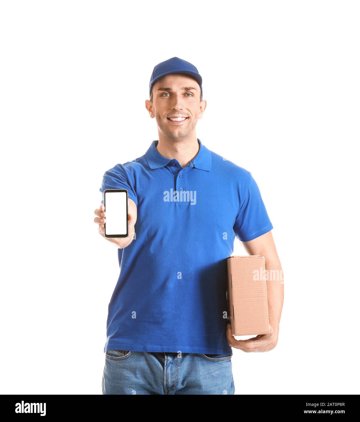 Delivery man with box and mobile phone on white background Stock Photo ...