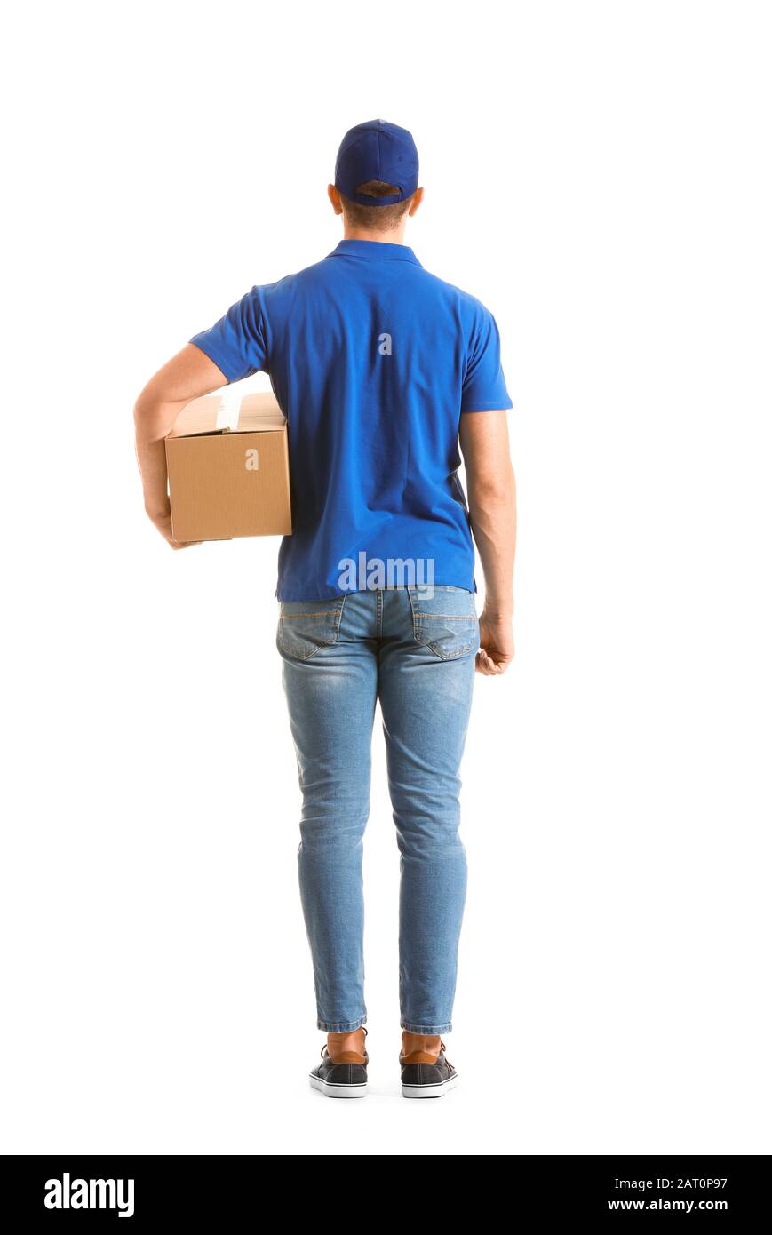 Delivery man with box on white background, back view Stock Photo - Alamy