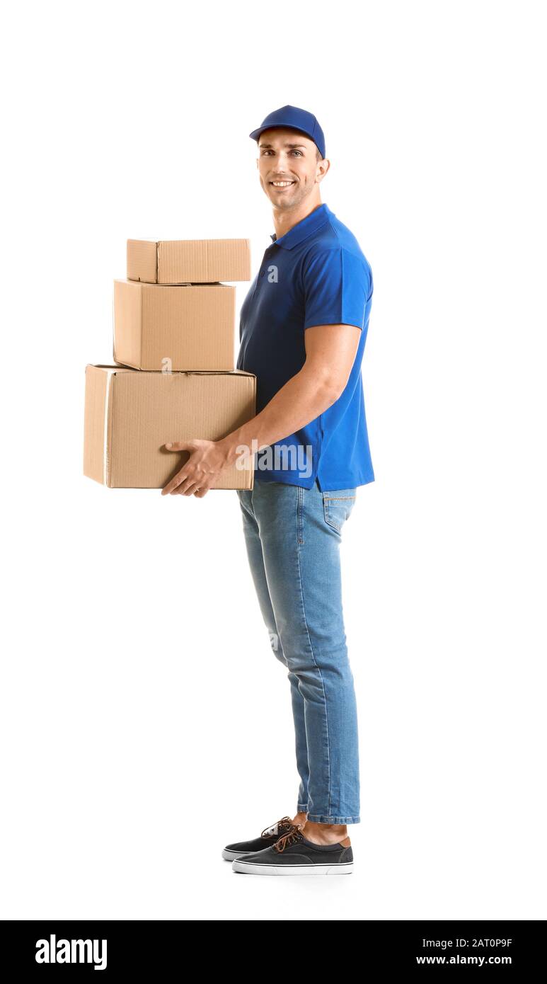 Delivery man with boxes on white background Stock Photo - Alamy