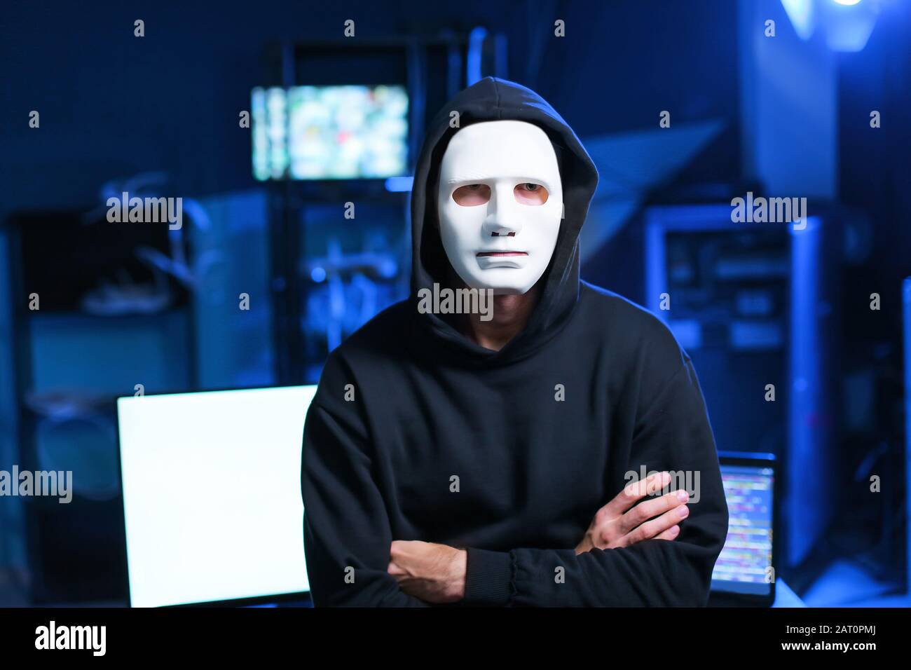 Hacker in mask hi-res stock photography and images - Alamy
