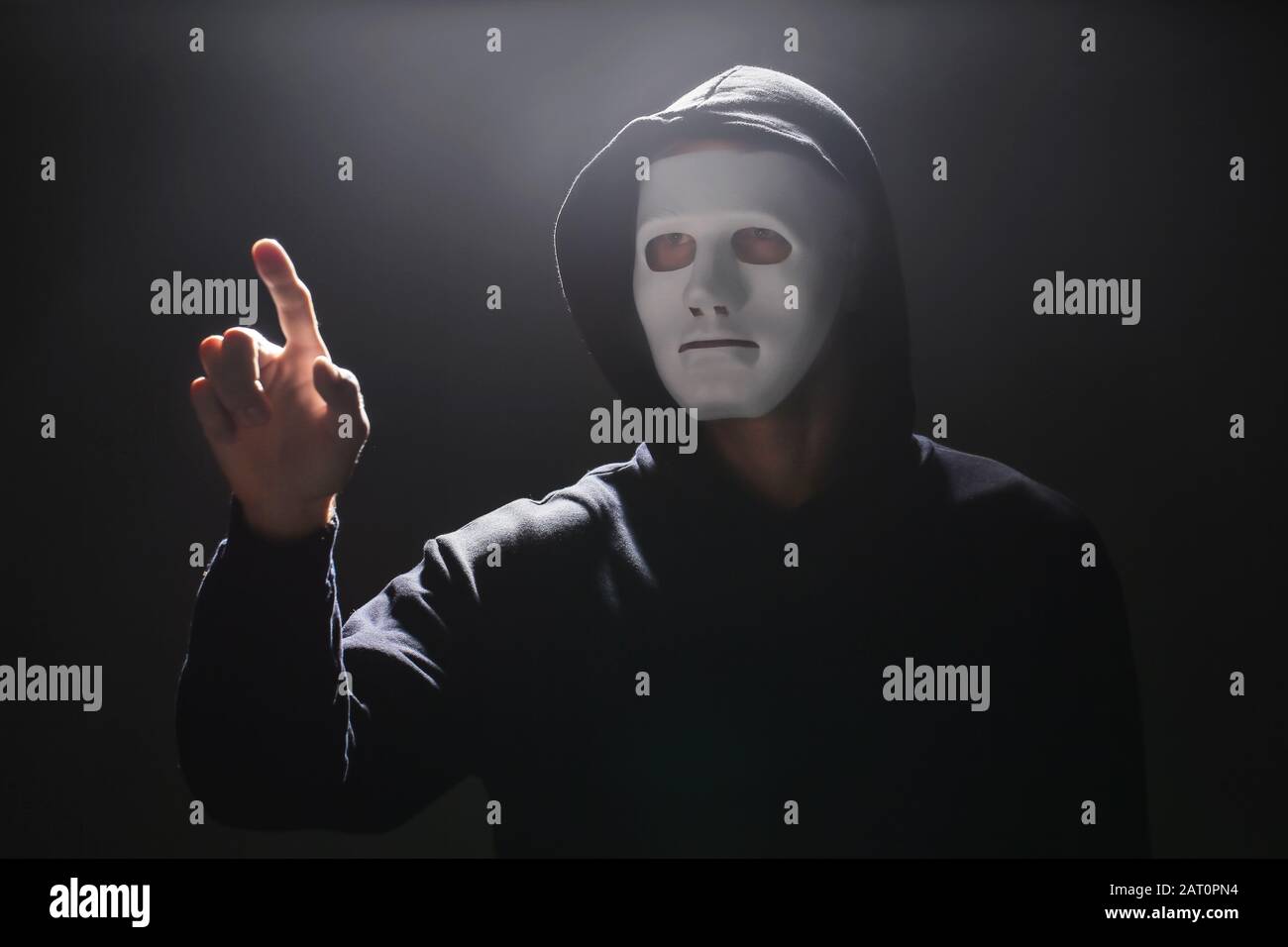 Professional hacker using virtual screen on dark background Stock Photo ...