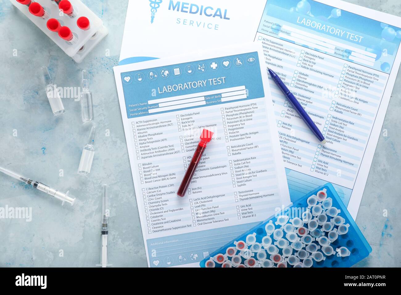 Laboratory test forms and blood samples on table Stock Photo - Alamy