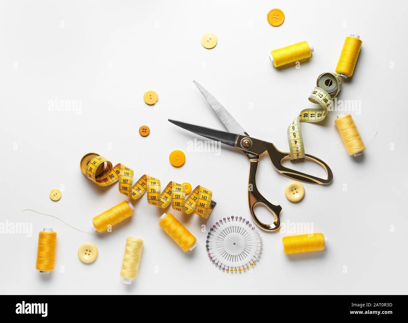Set of tailor's supplies on white background Stock Photo - Alamy