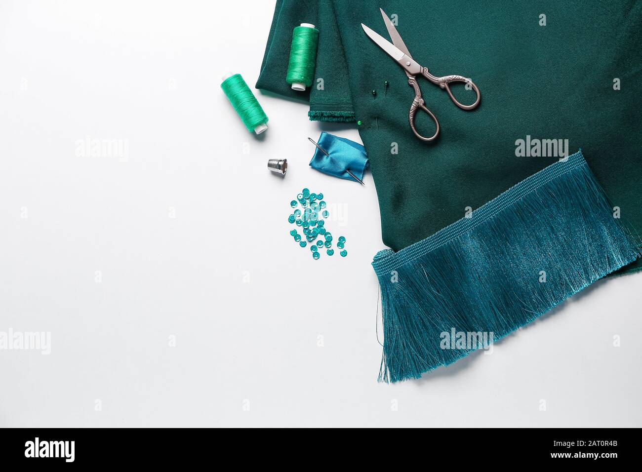 Set of tailor's supplies on white background Stock Photo - Alamy
