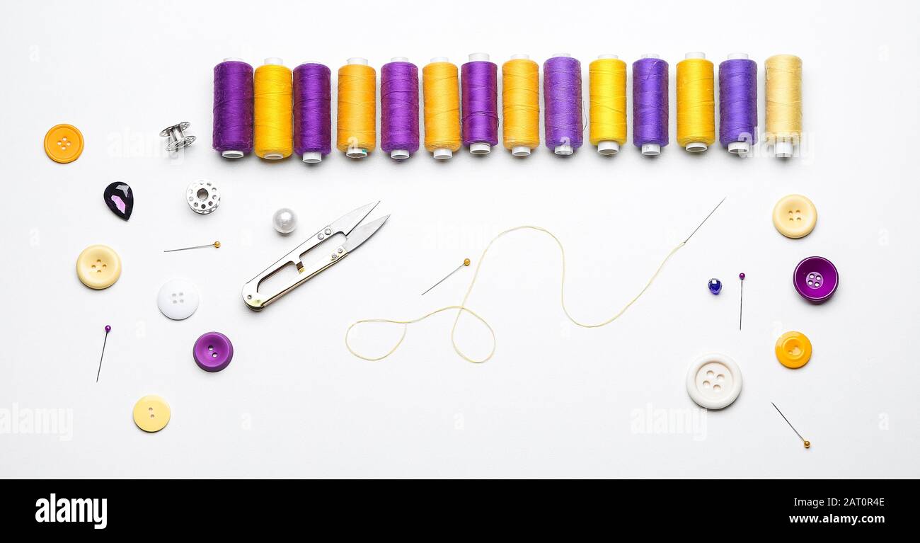 Set of tailor's supplies on white background Stock Photo - Alamy