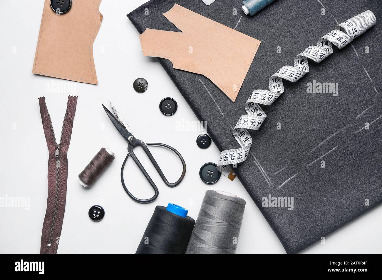 Set of tailor's supplies with sewing pattern on white background Stock ...