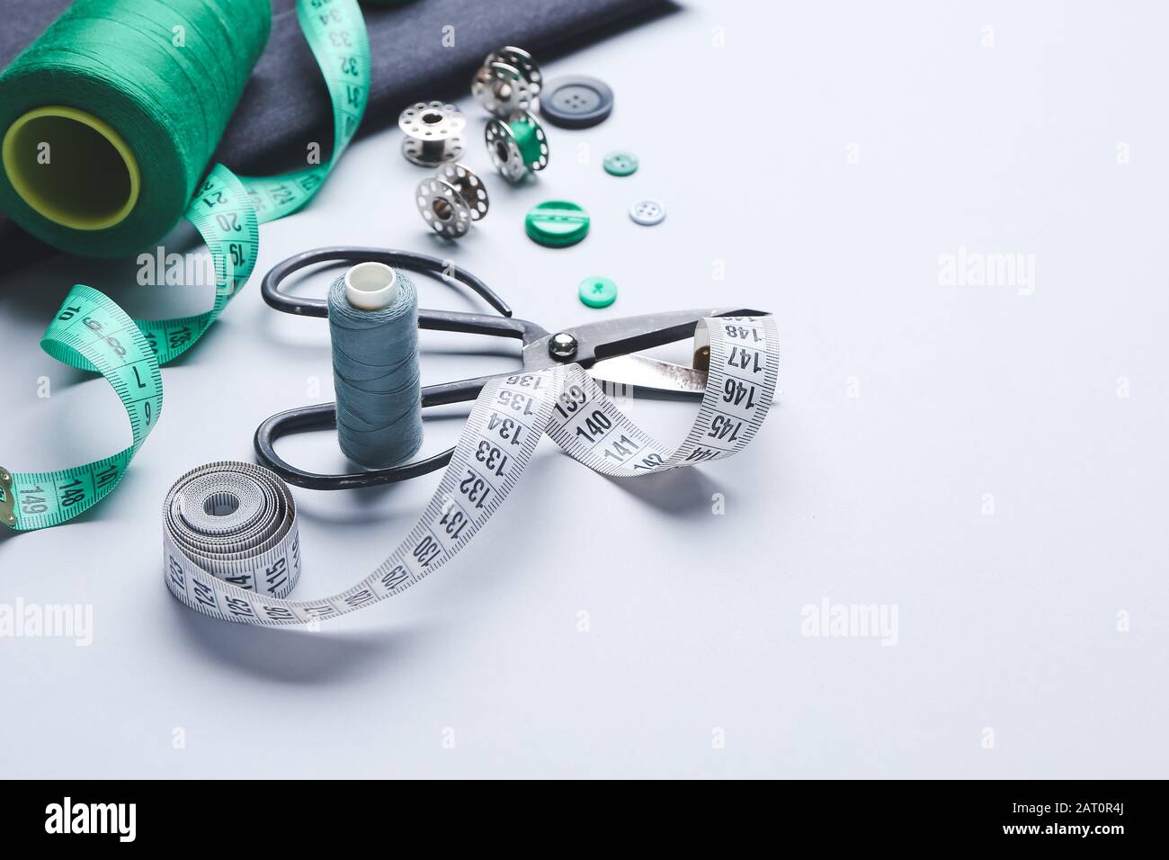 Set of tailor's supplies on white background Stock Photo - Alamy