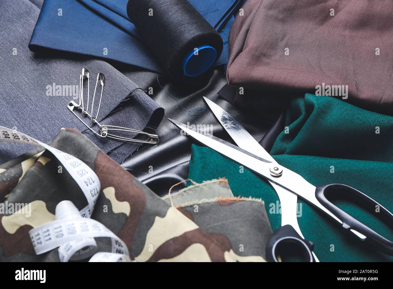 Set of tailor's supplies on fabric Stock Photo - Alamy