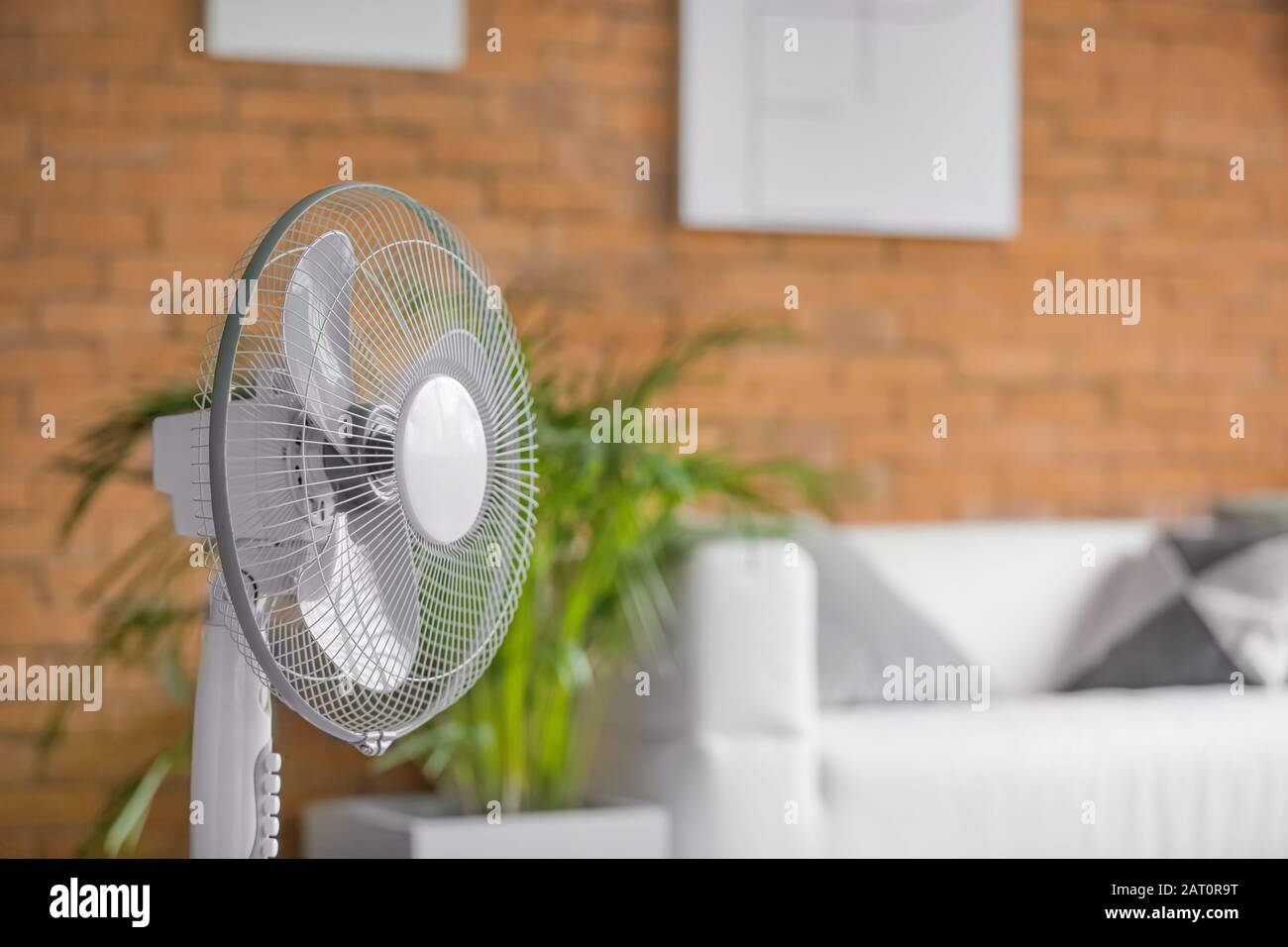 Modern electric fan in room Stock Photo - Alamy