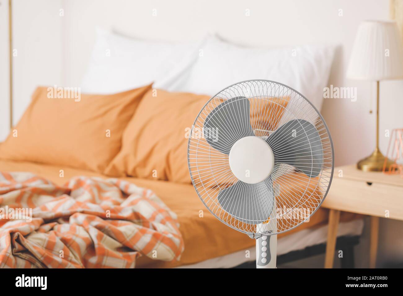Modern electric fan in bedroom Stock Photo - Alamy