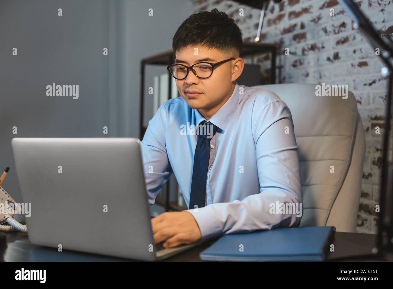 Asian man working in office hi-res stock photography and images - Alamy