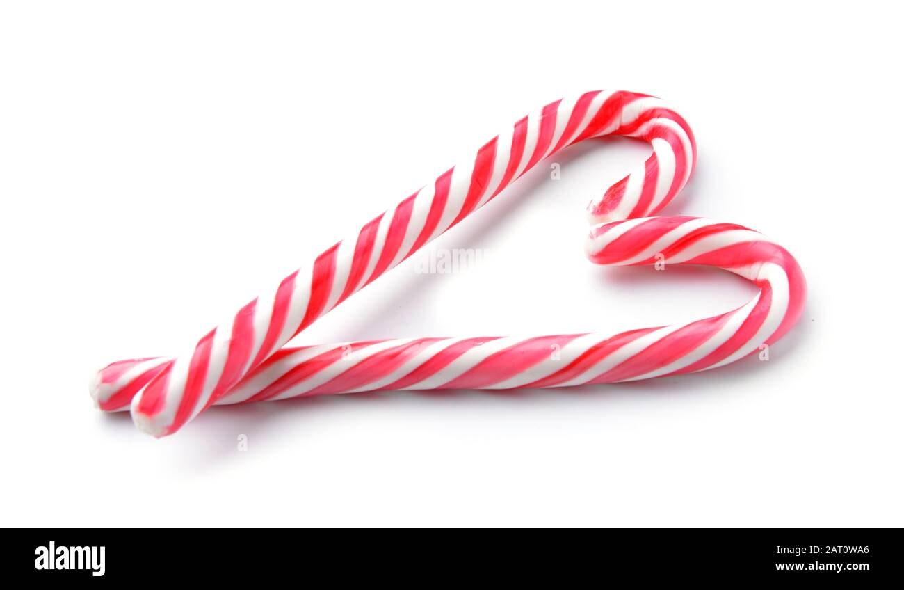 Candy canes on color Cut Out Stock Images & Pictures - Alamy