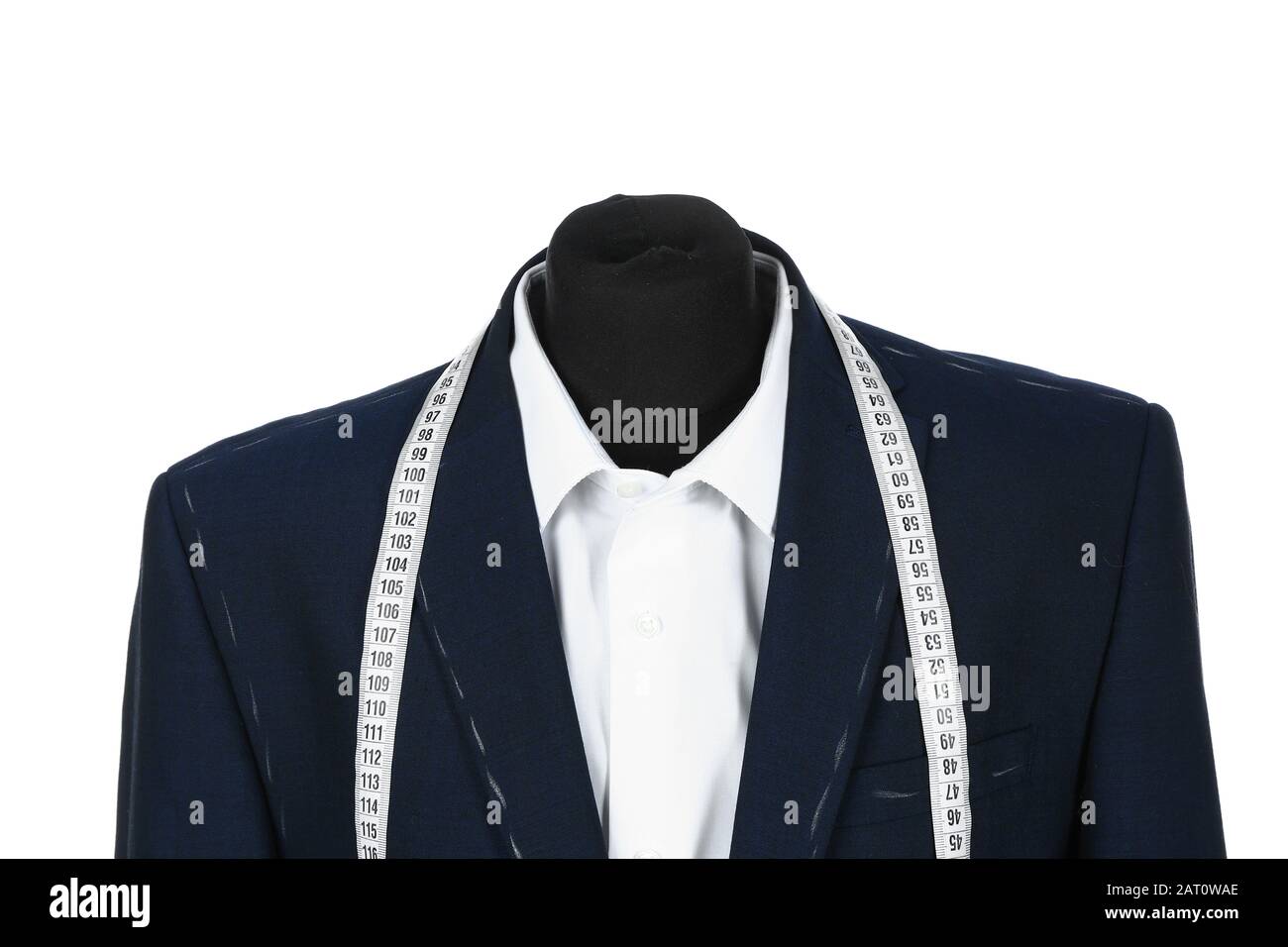 Tailor's mannequin with unfinished clothes and measuring tape on white ...