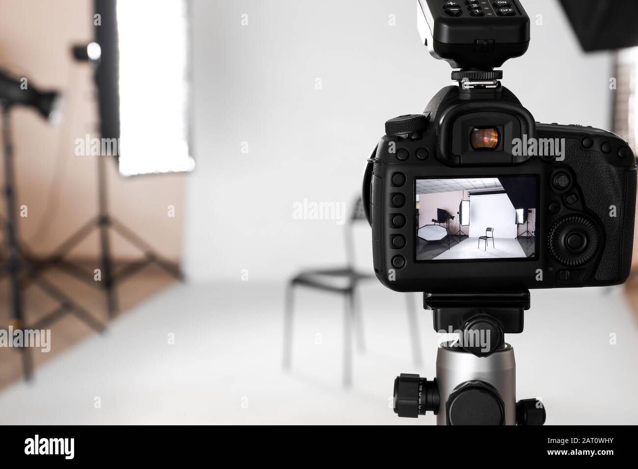 Modern photo camera in professional studio Stock Photo - Alamy