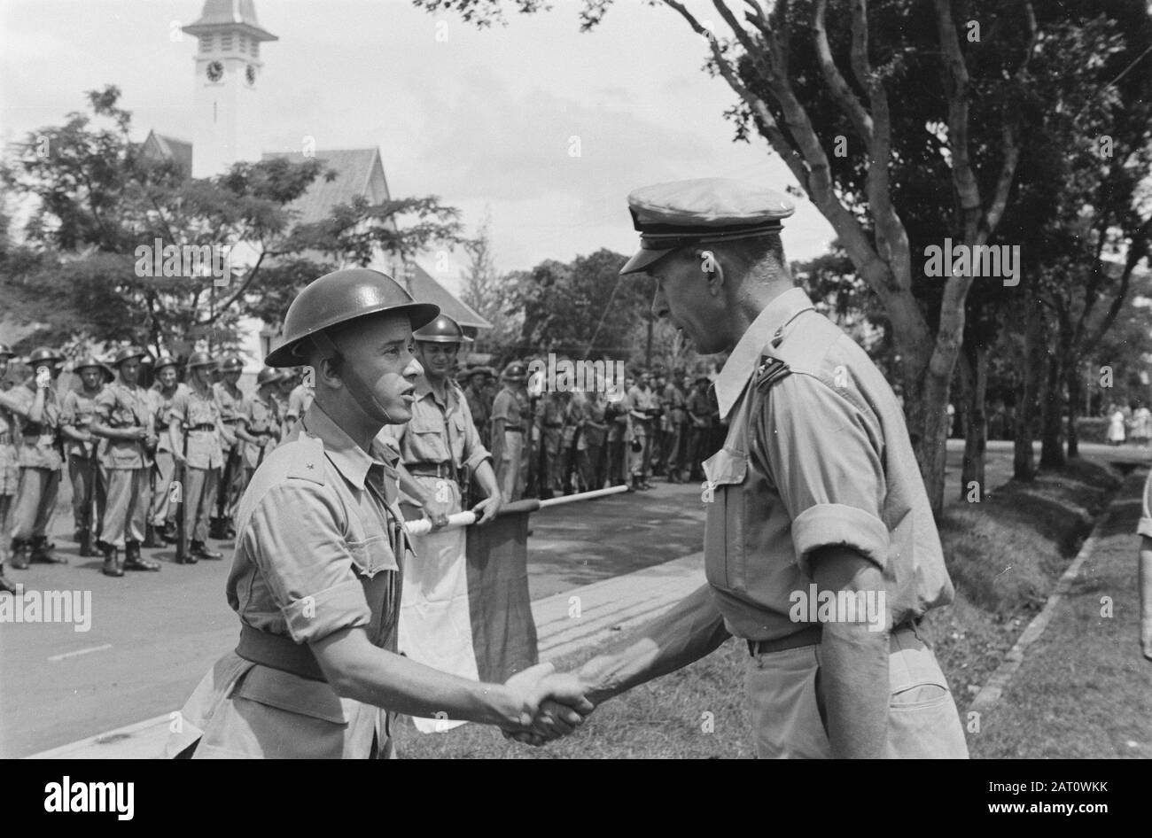 Swearing A lieutenant colonel of the KNIL congratulates the lieutenant ...