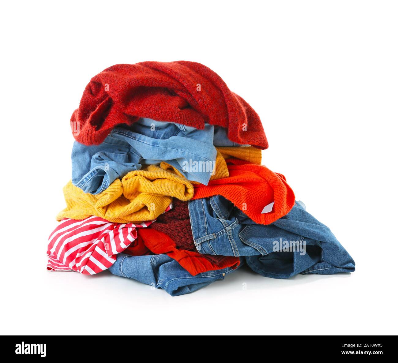 Heap of different clothes on white background Stock Photo - Alamy