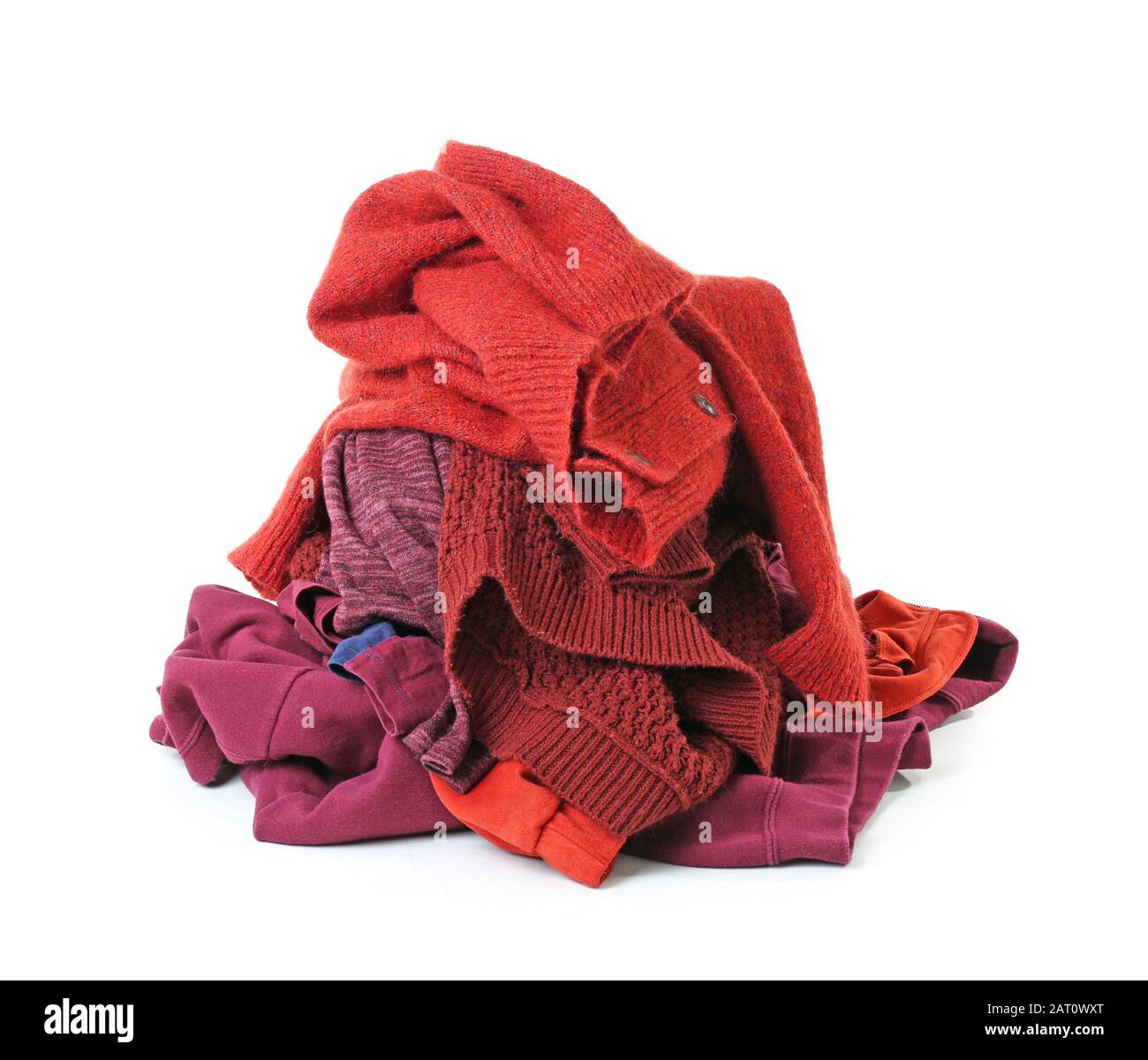 Heap of different clothes on white background Stock Photo - Alamy