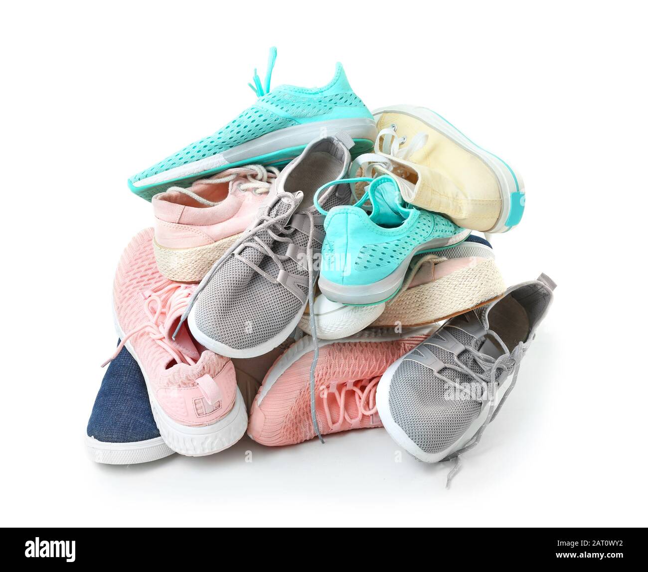 Heap of different shoes on white background Stock Photo - Alamy