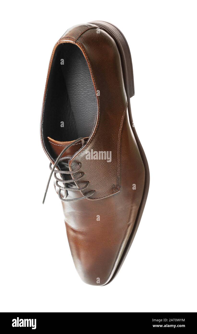 Flying male shoe on white background Stock Photo - Alamy