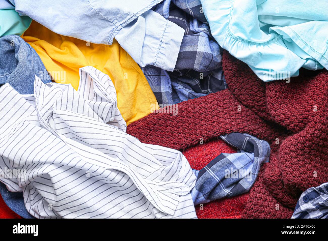 Heap of different clothes, top view Stock Photo - Alamy
