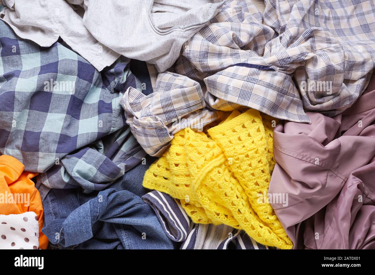 Heap of different clothes, top view Stock Photo - Alamy