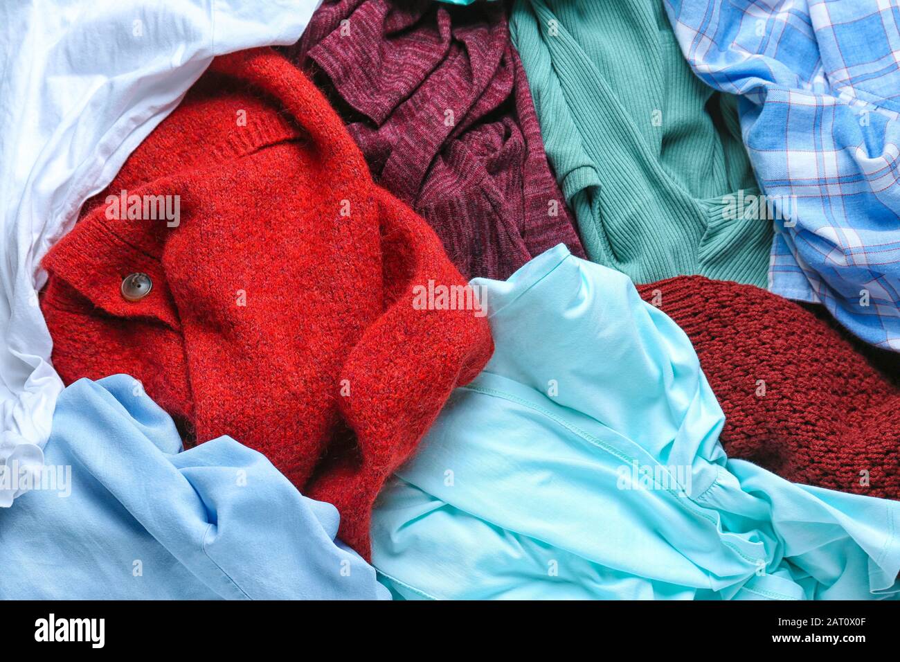 Heap of different clothes, top view Stock Photo - Alamy