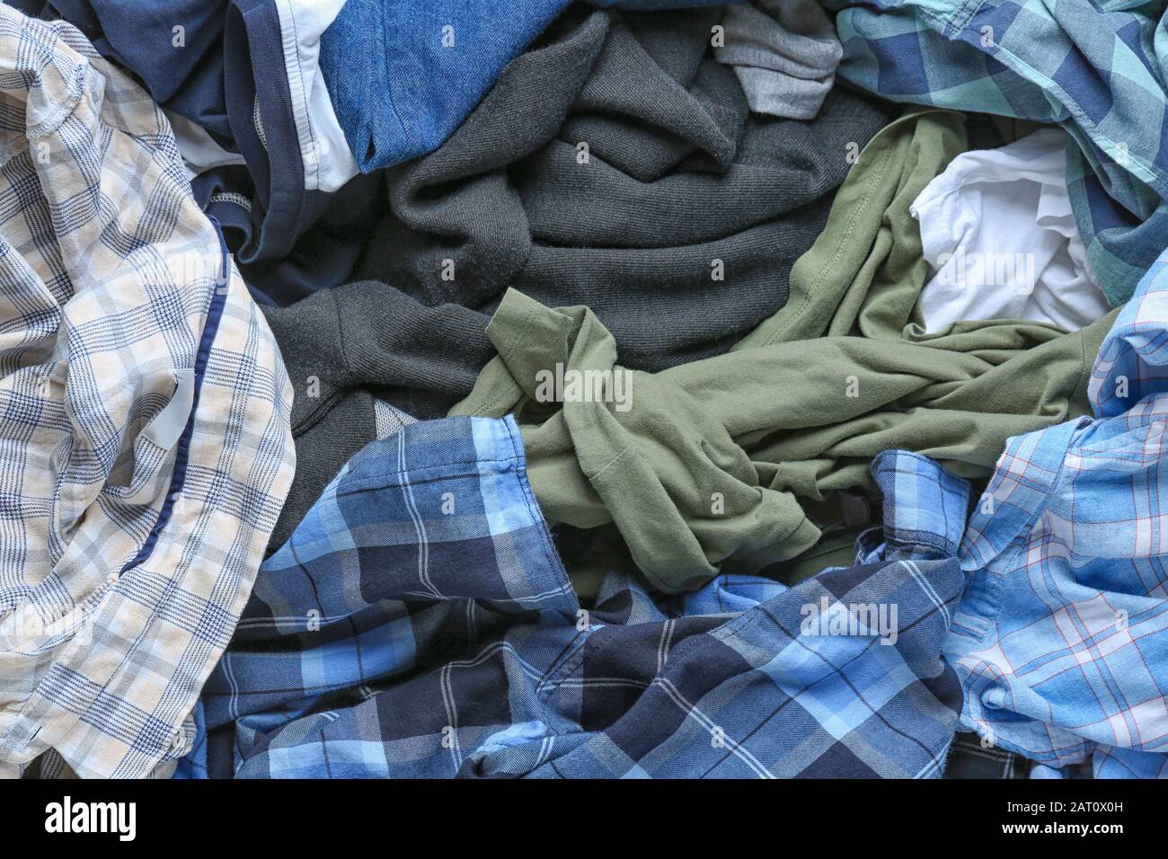 Heap of different clothes, top view Stock Photo - Alamy