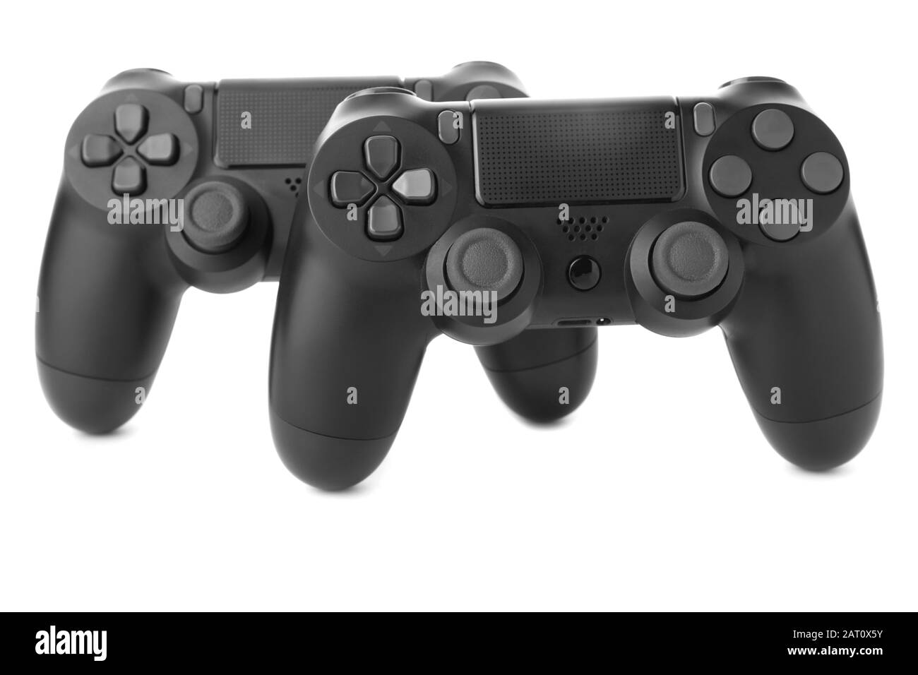 Modern game pads on white background Stock Photo - Alamy