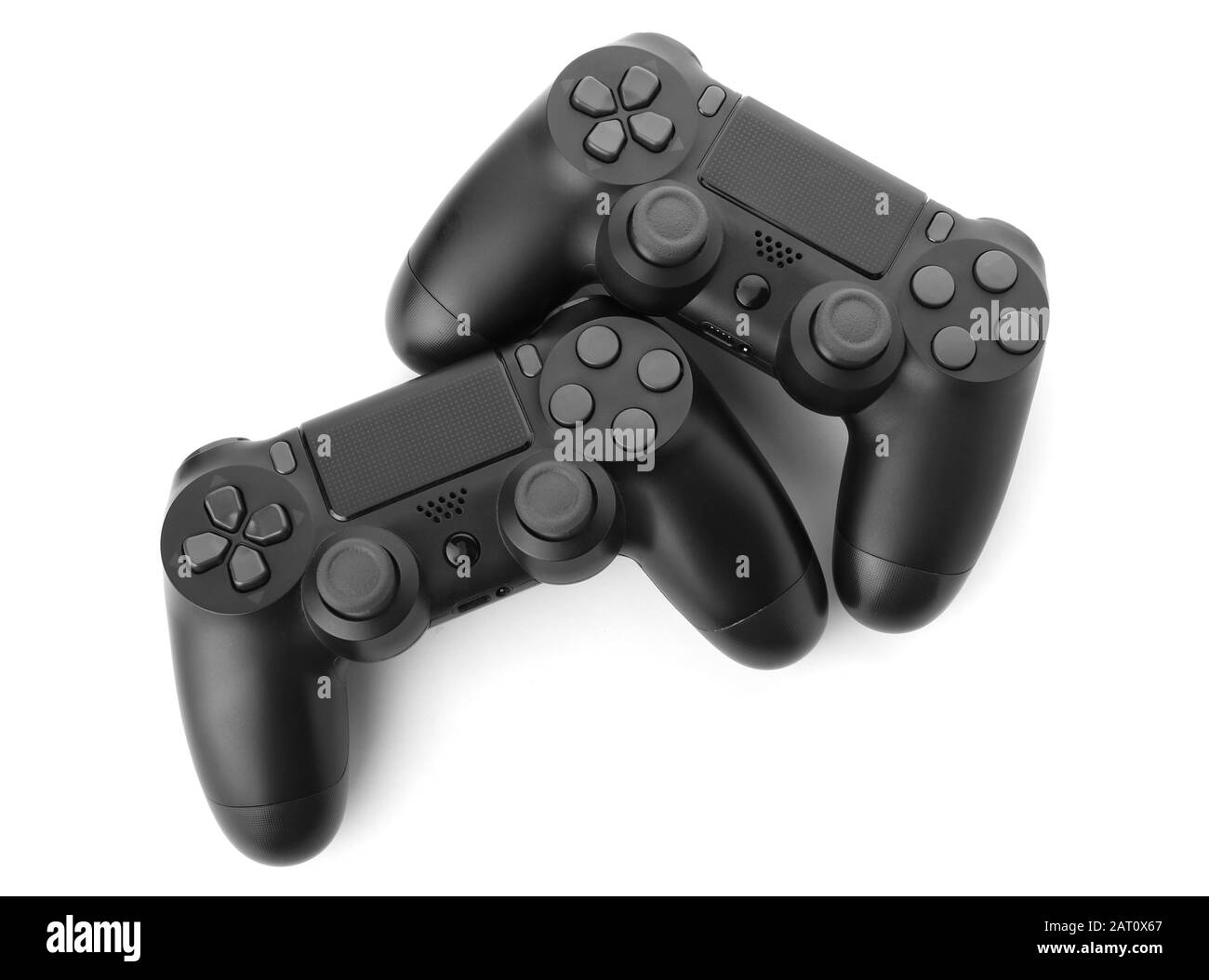 Modern game pads on white background Stock Photo - Alamy