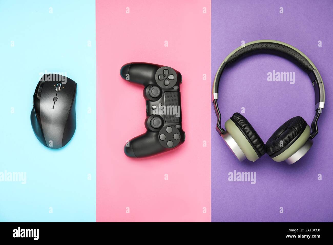 Modern gaming accessories on color background Stock Photo - Alamy