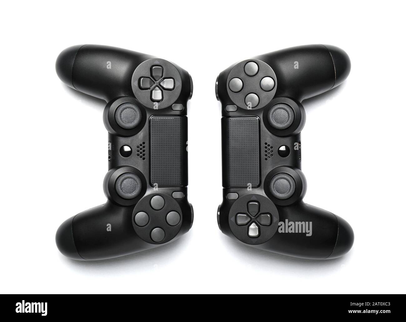 Modern game pads on light background Stock Photo - Alamy