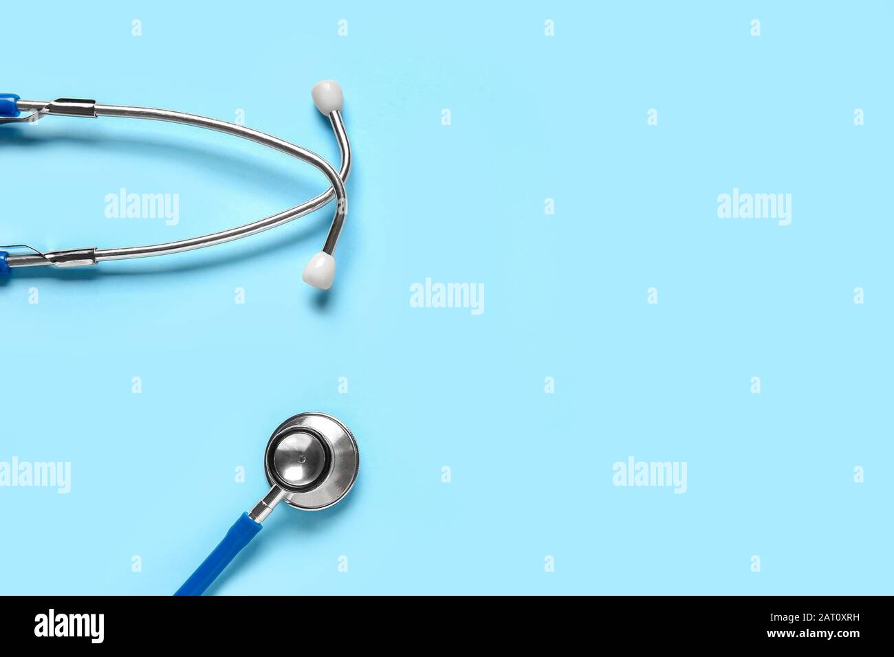 Modern stethoscope on color background Stock Photo - Alamy